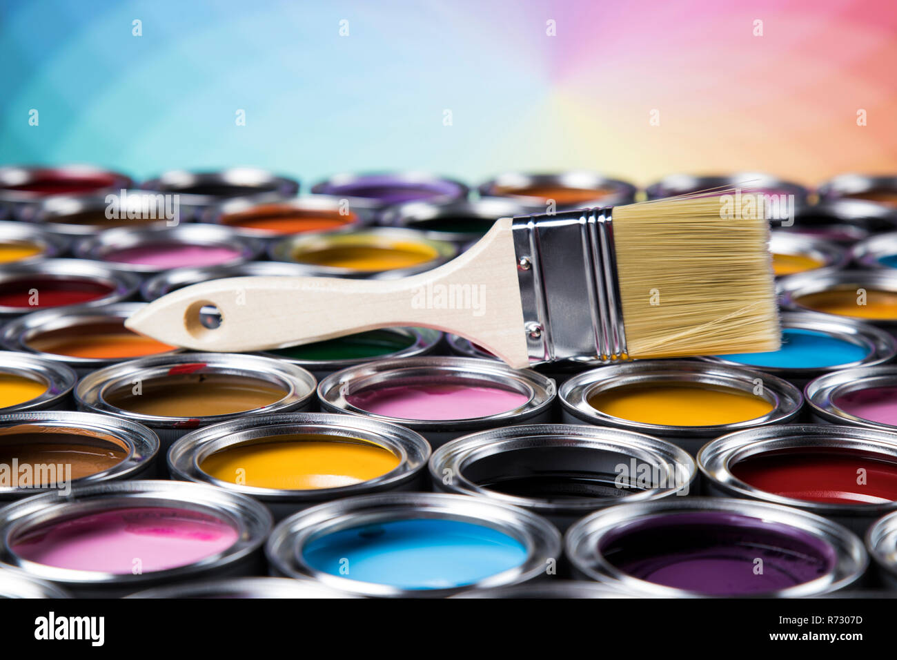 Open paint cans with a brush, Rainbow colors Stock Photo - Alamy