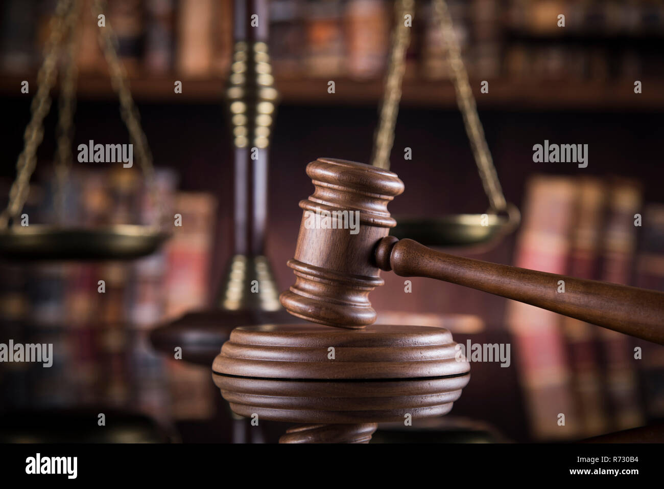 Law theme, mallet of the judge, justice scale, mirror reflection ...