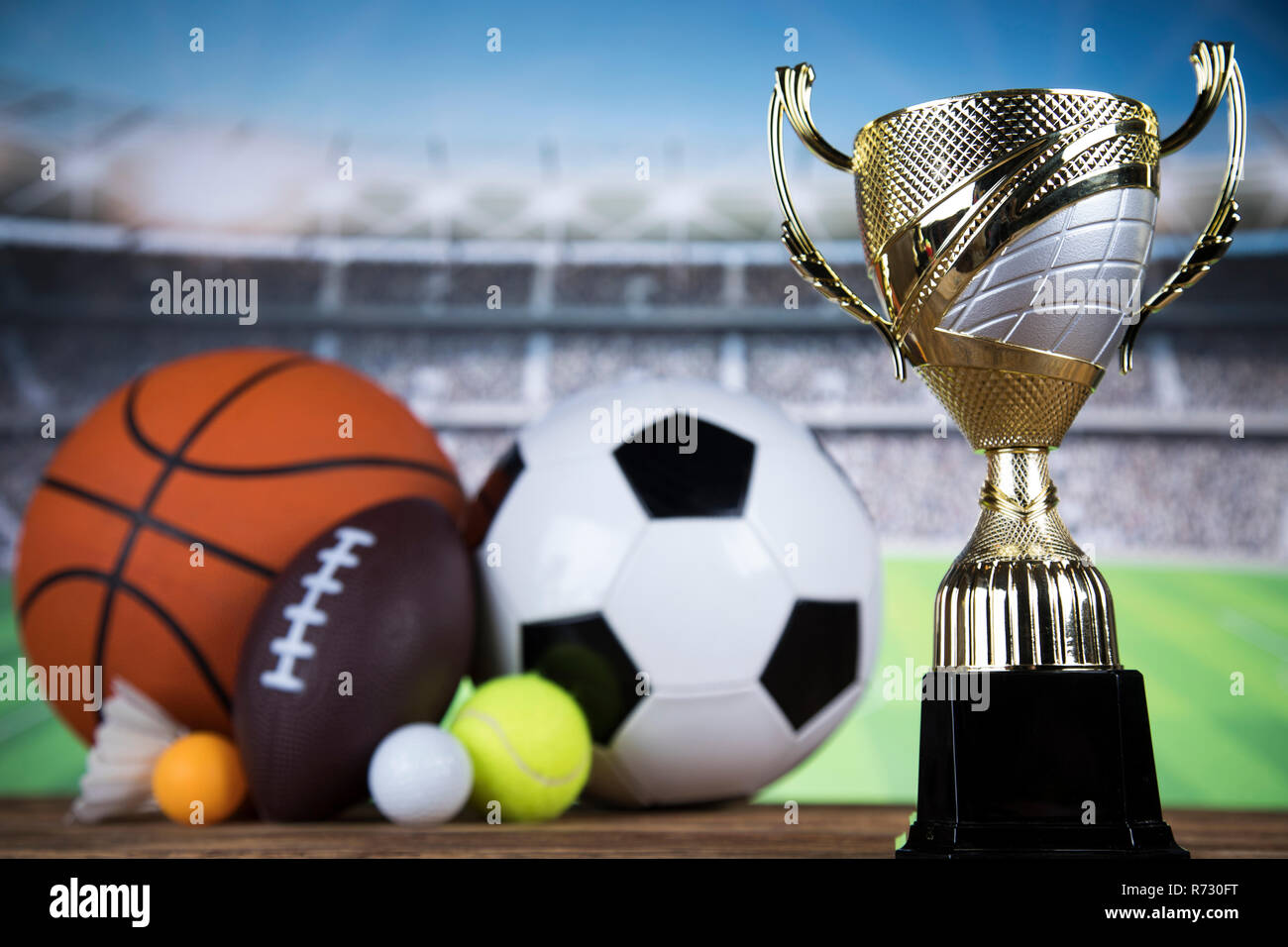 Winner trophy, Sport equipment and balls Stock Photo - Alamy