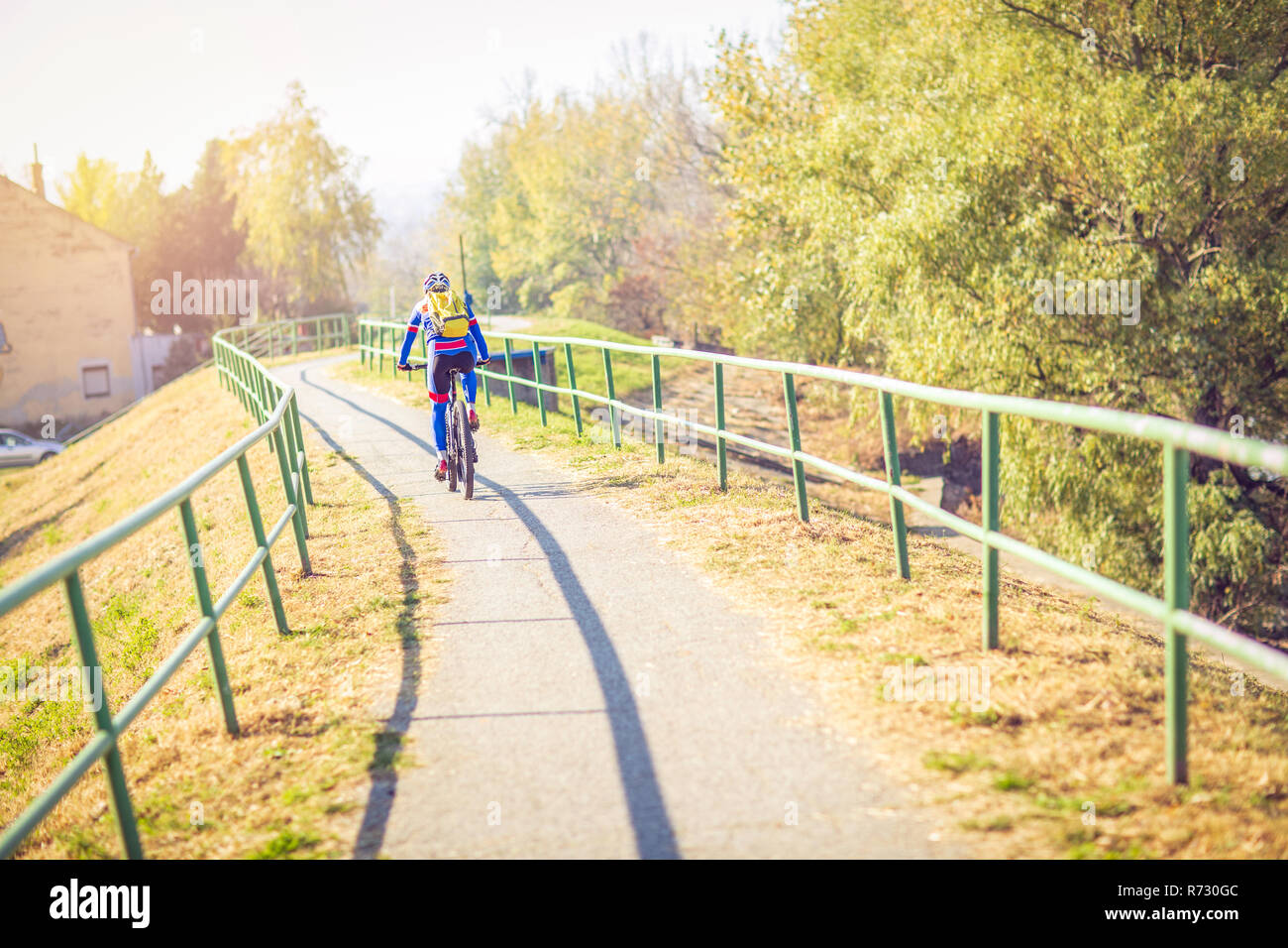 Sport. Professional Bike cyclist man riding single track Stock Photo ...