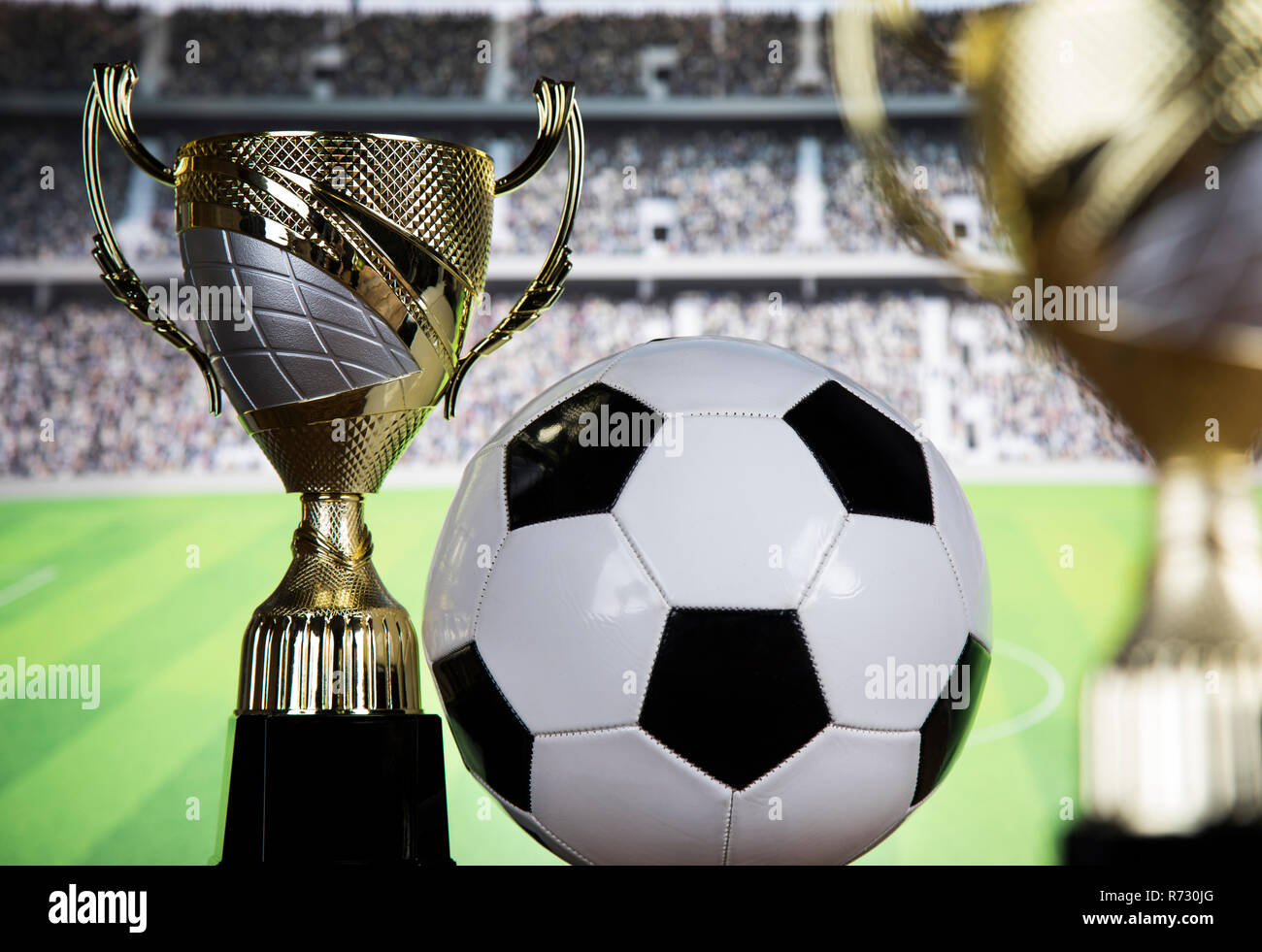 Winner trophy, Sport equipment and balls Stock Photo - Alamy