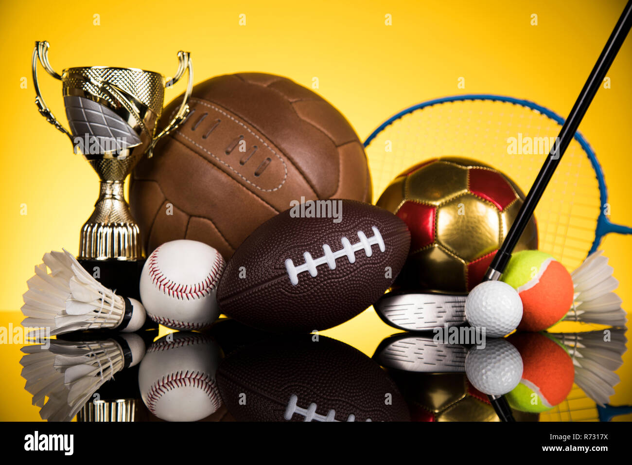 Winner trophy, Sport equipment and balls Stock Photo - Alamy