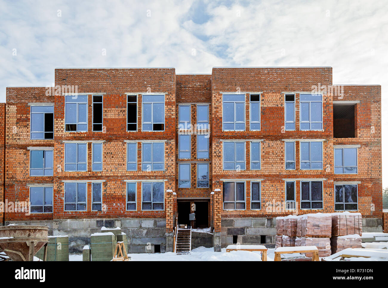 Brick house from a red brick, construction area construction of multi ...