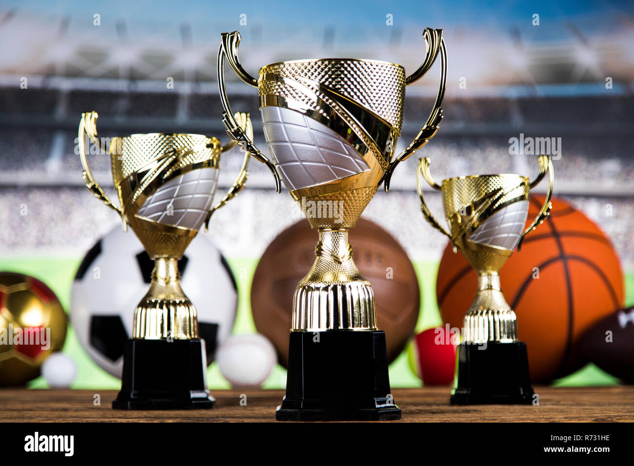 Winner trophy, Sport equipment and balls Stock Photo - Alamy