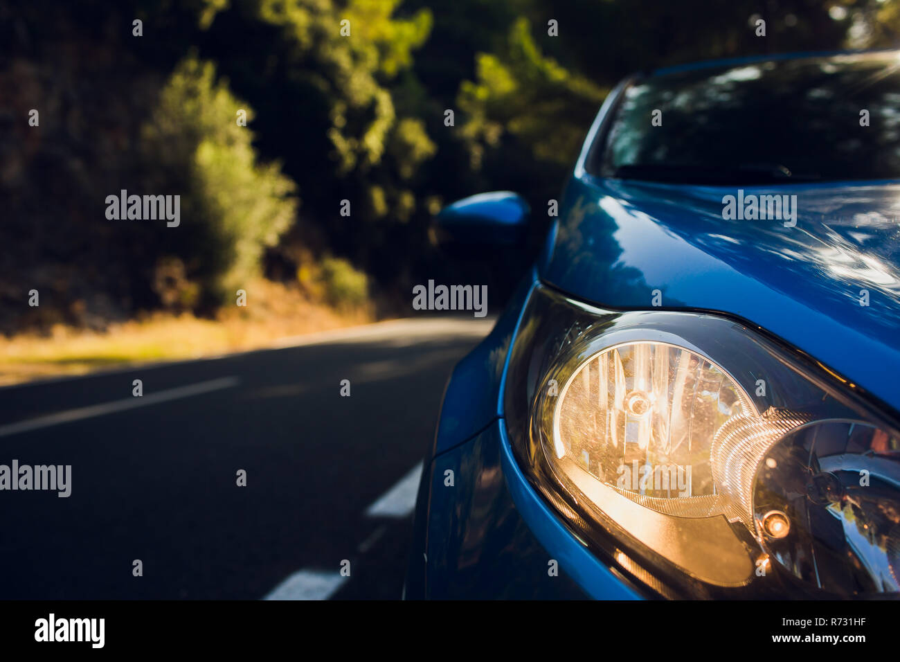 Great Car - Front side, half. On the road Stock Photo - Alamy