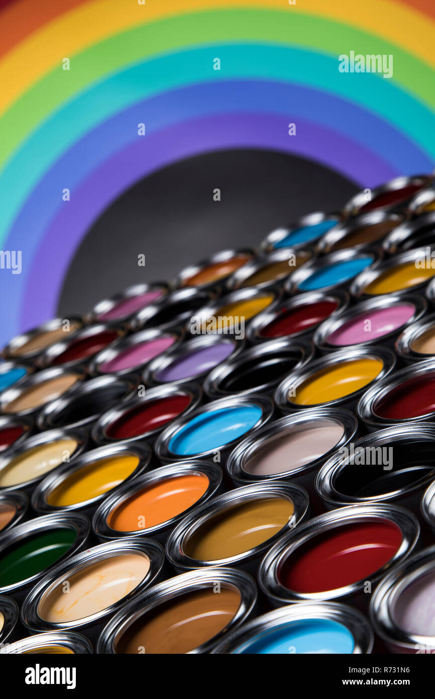 Rainbow colors, Group of tin metal cans Stock Photo - Alamy