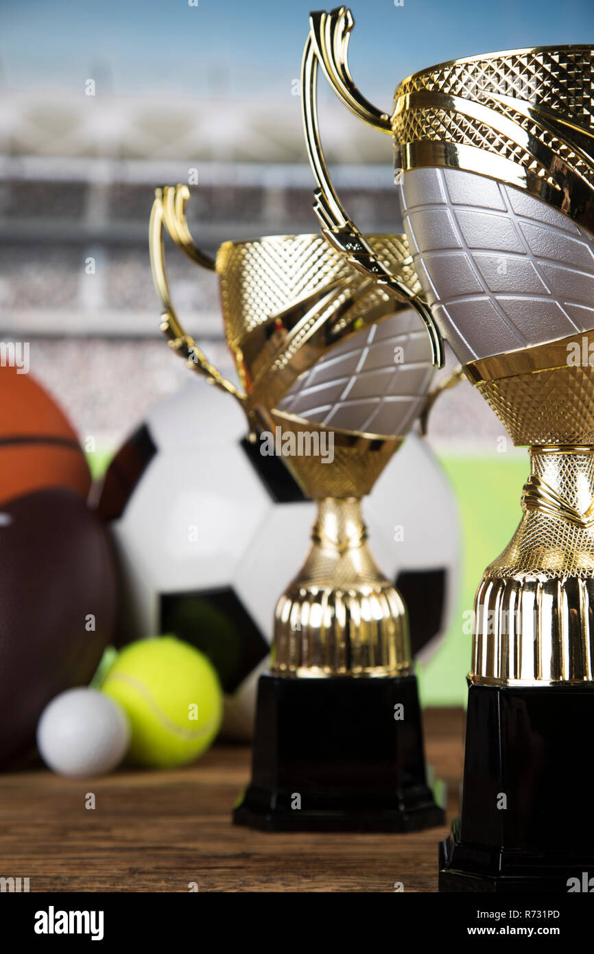 Winner trophy, Sport equipment and balls Stock Photo - Alamy