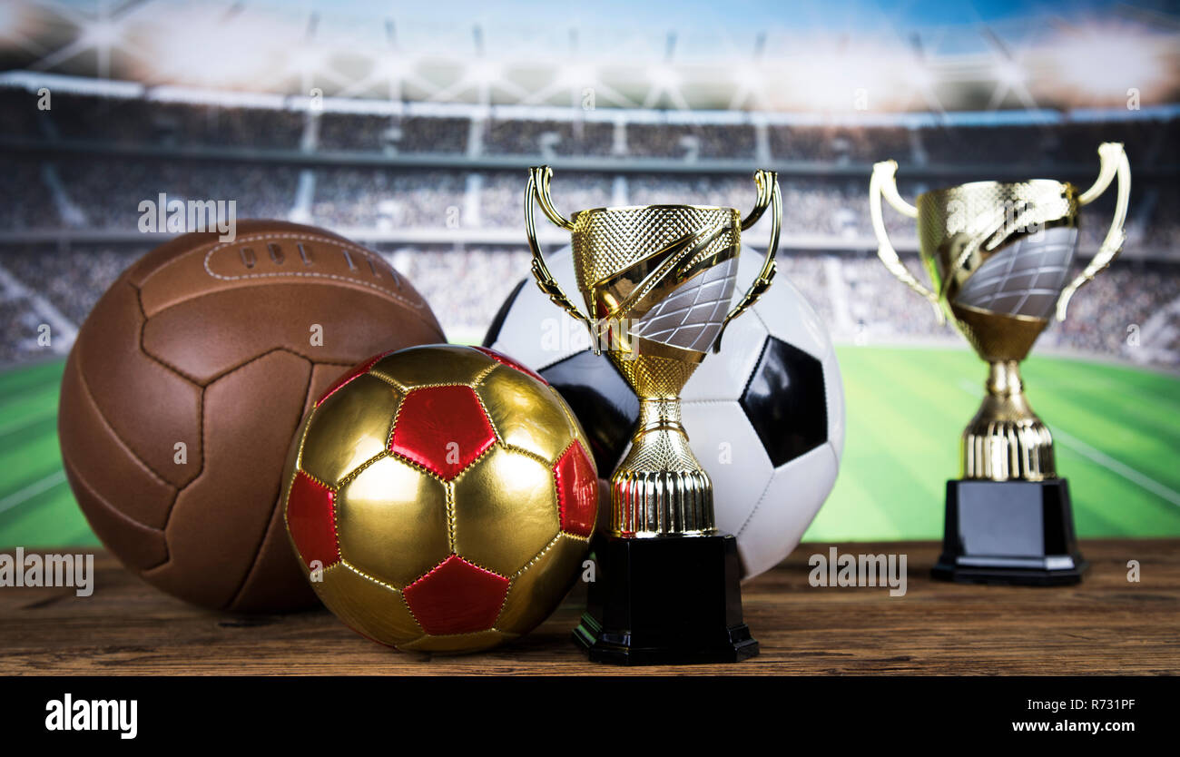 Winner trophy, Sport equipment and balls Stock Photo - Alamy