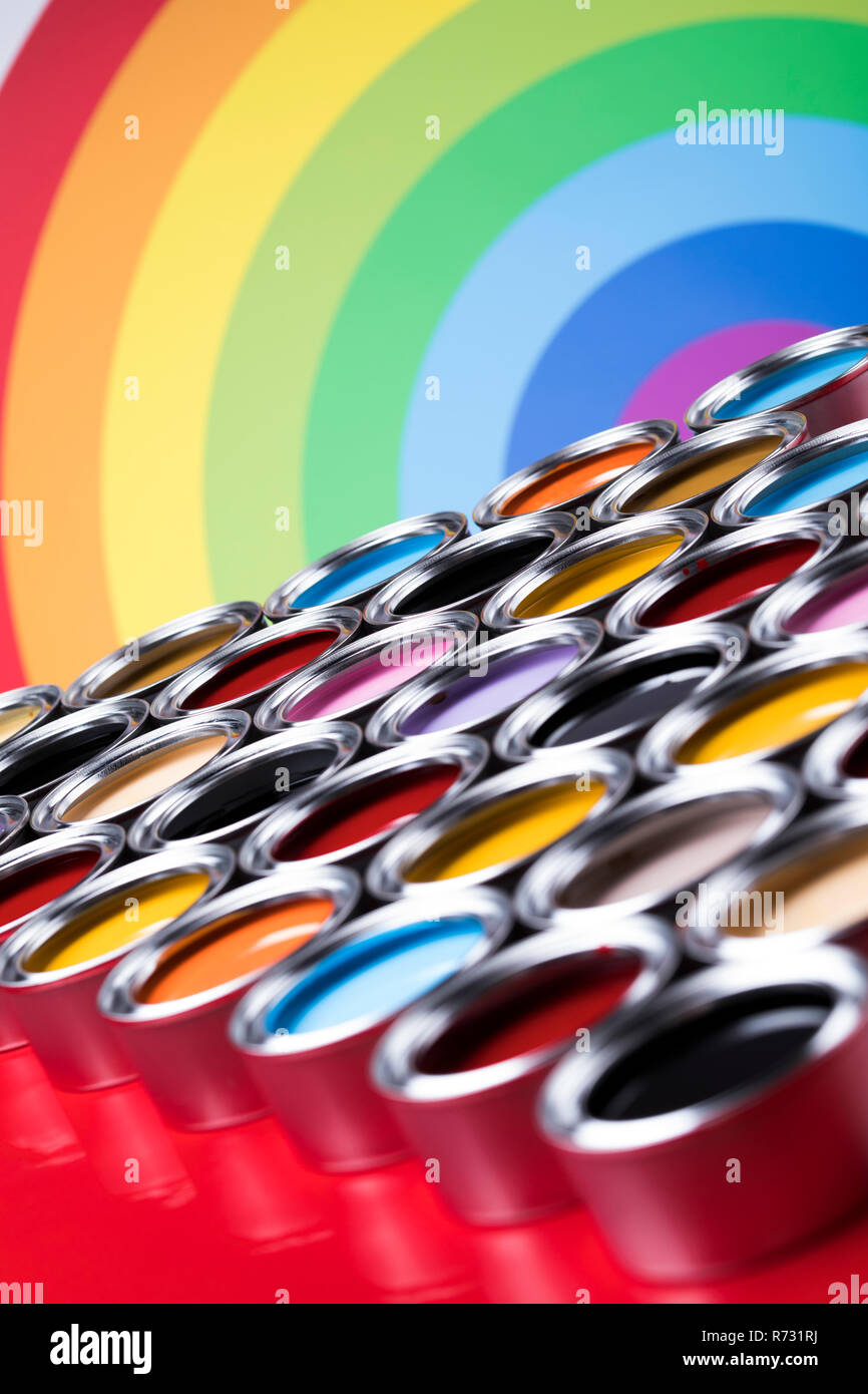 Rainbow colors, Open cans of paint Stock Photo - Alamy