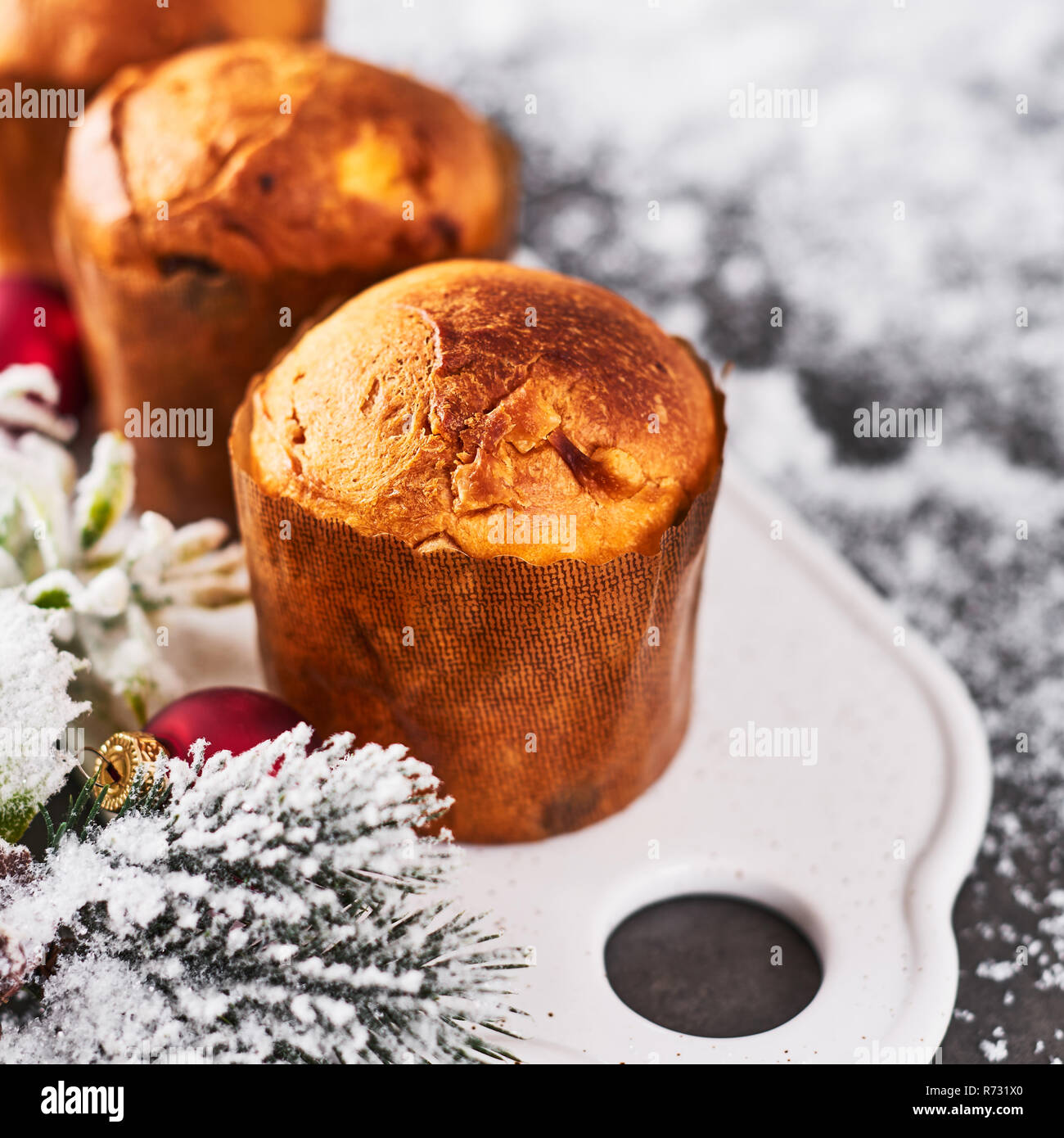 Traditional Christmas Panettone with raisins and dried fruits on white ...