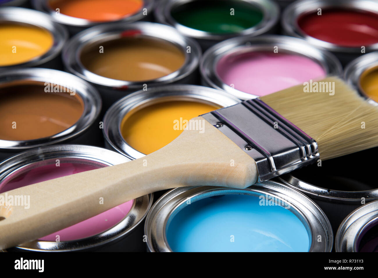 Paint brush, tin can and color guide samples Stock Photo - Alamy