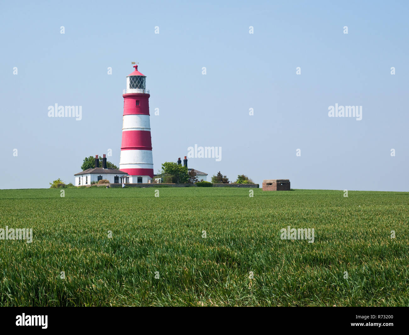 The Happisburgh lighthouse, in the Norfolk coastal village of ...