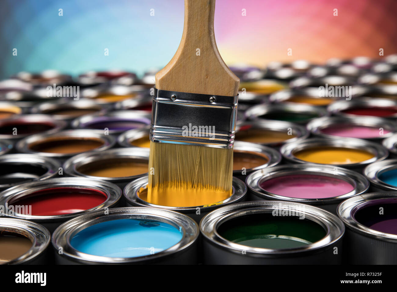 Colorful paint cans with paintbrush Stock Photo - Alamy
