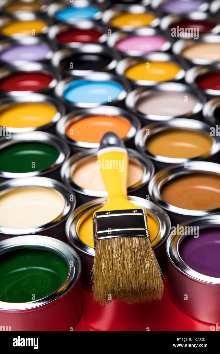 Paint brush, tin can and color guide samples Stock Photo - Alamy