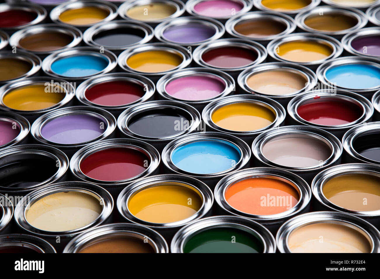 Collection of colored paints cans Stock Photo - Alamy