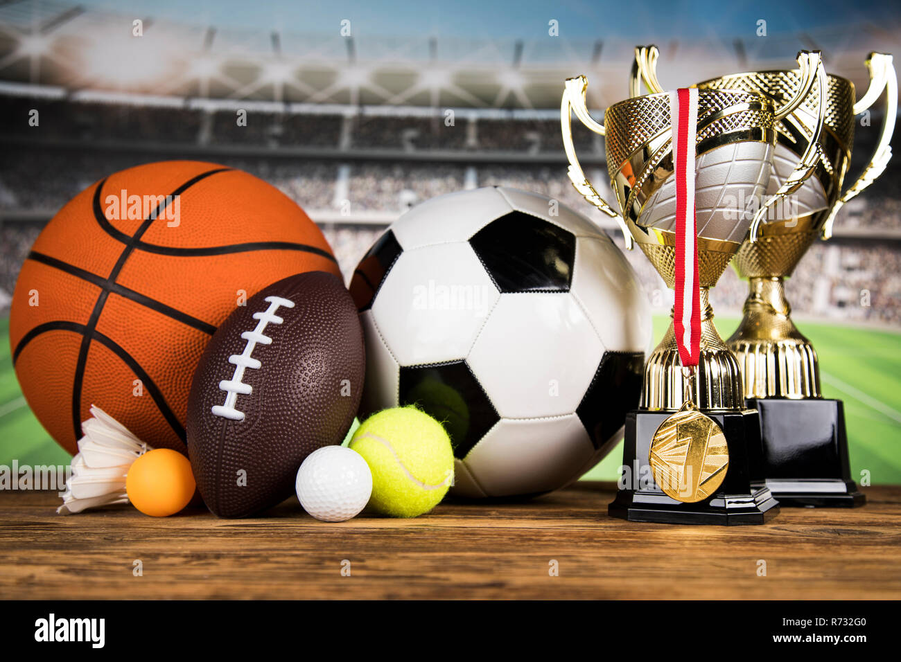 Winner trophy, Sport equipment and balls Stock Photo - Alamy