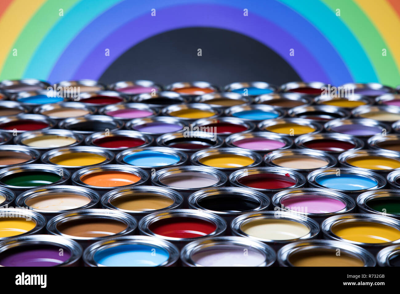 Rainbow colors, Open cans of paint Stock Photo - Alamy