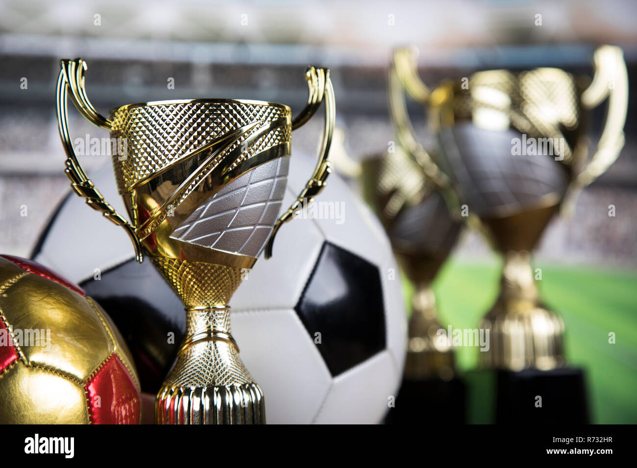 Winner trophy, Sport equipment and balls Stock Photo - Alamy