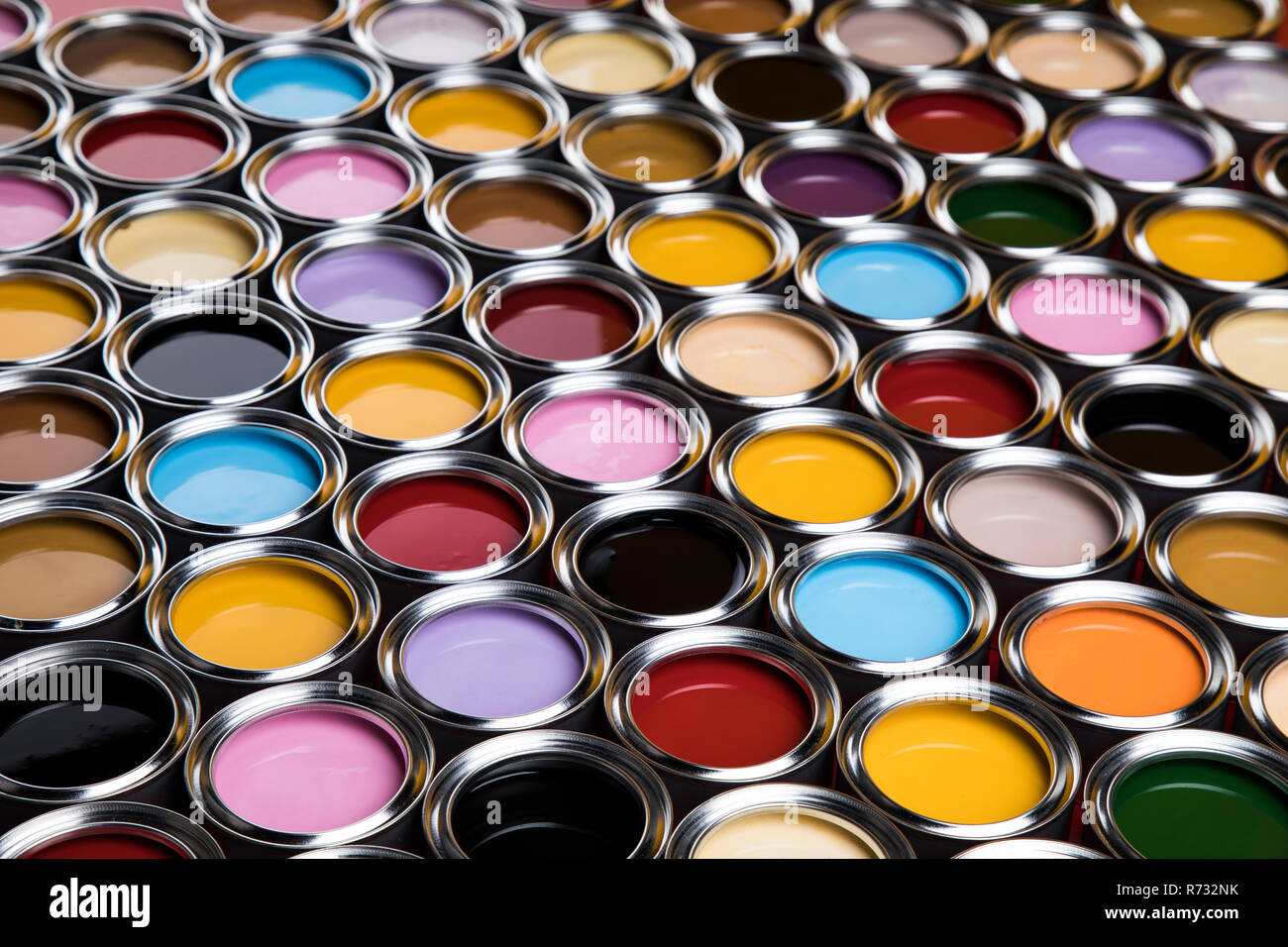 Collection of colored paints cans Stock Photo - Alamy