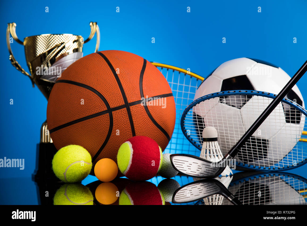 Winner trophy, Sport equipment and balls Stock Photo - Alamy