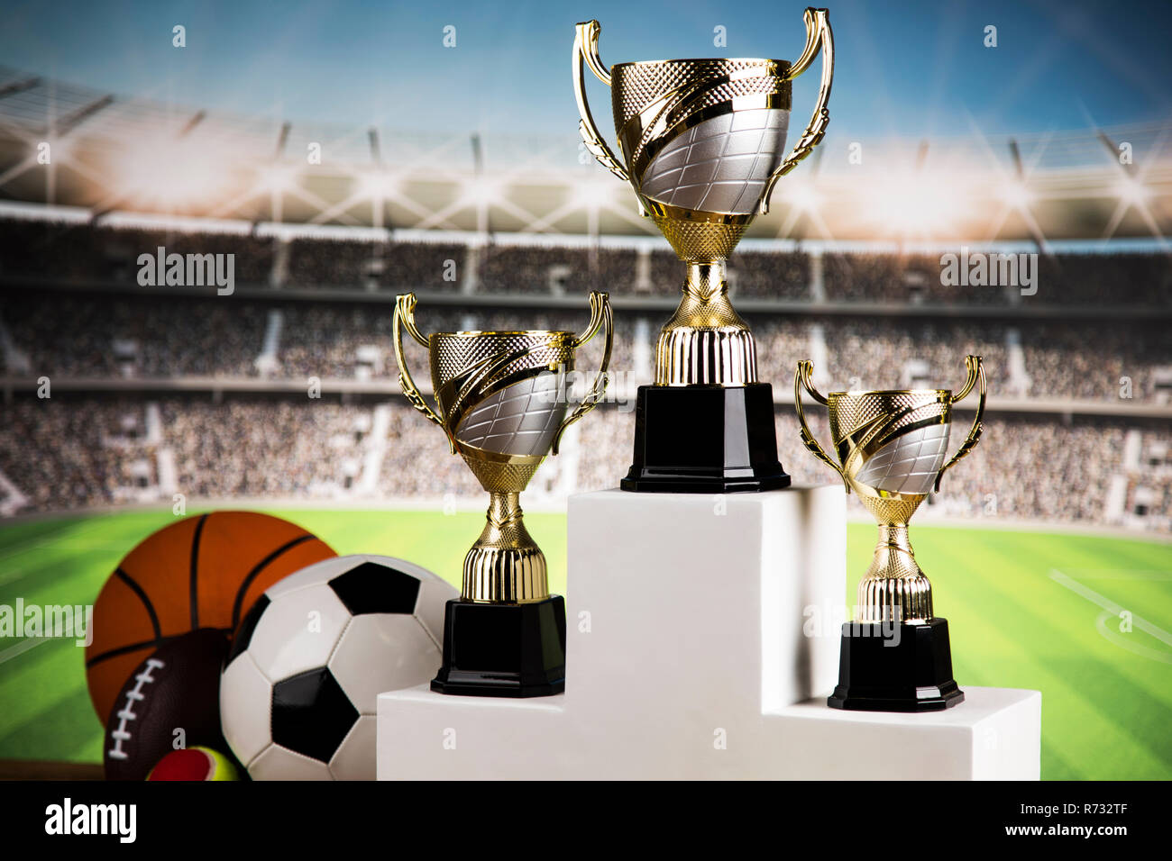 Sport podium, Cups of winners award Stock Photo - Alamy