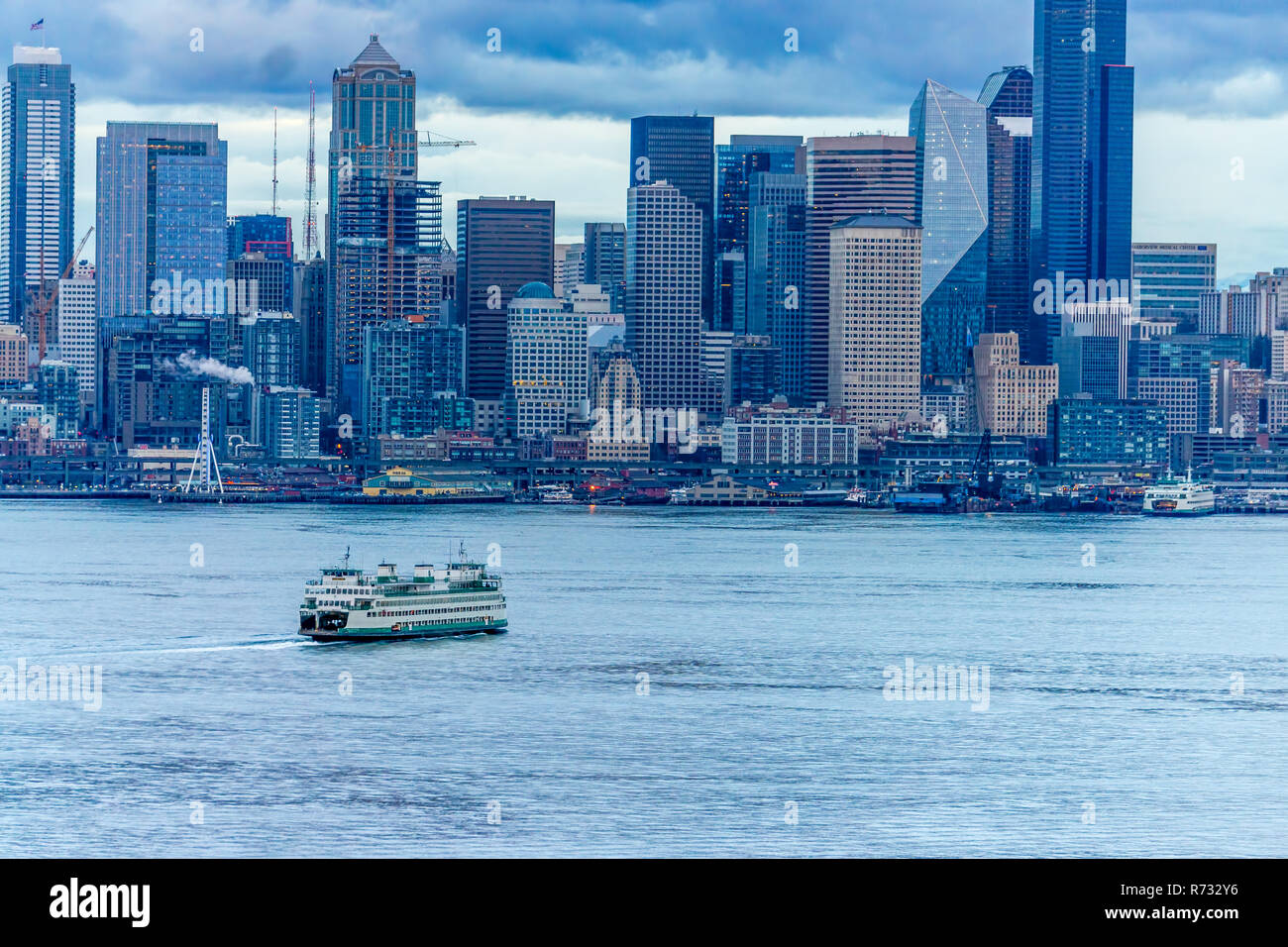A view of the Seattle skyline with dark clouds overhead Stock Photo - Alamy