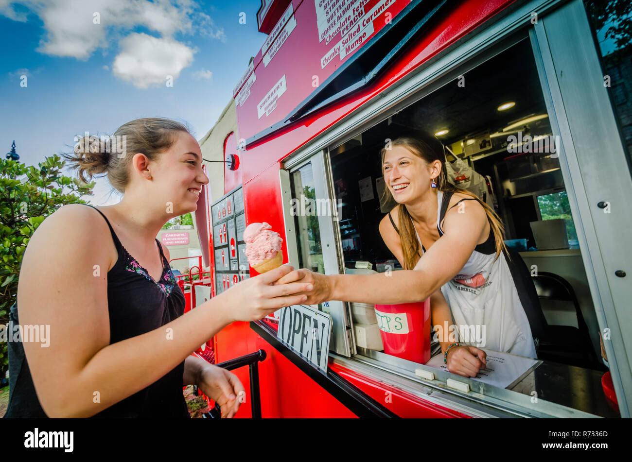 Kelly Croteau purchases a strawberry ice cream cone from Bethany ...