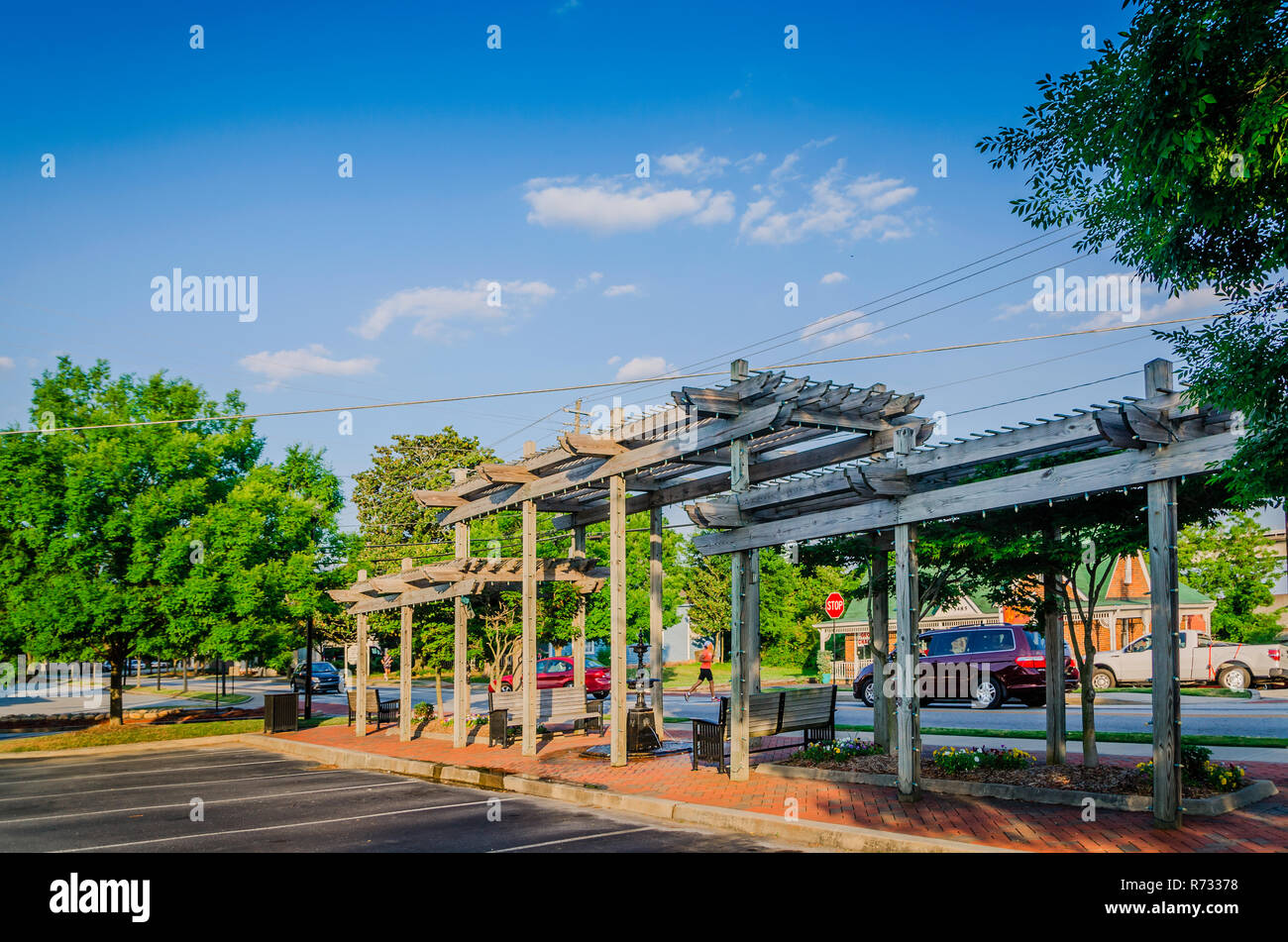 The sun sets on the pergola and fountain in downtown Chamblee, Georgia, May 20, 2014 Stock Photo ...