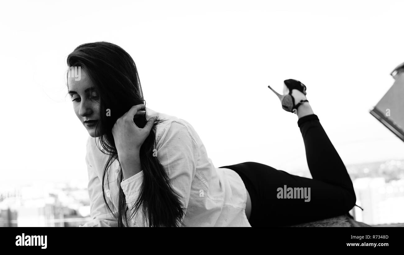 girl poses the roof Stock Photo - Alamy