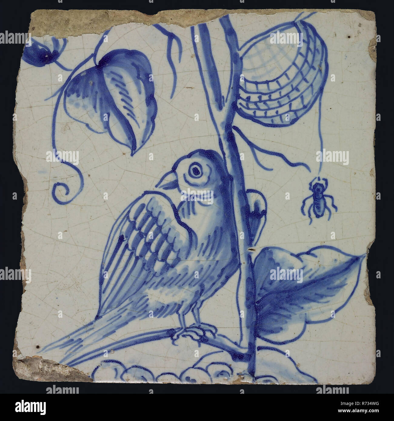 Blue tile with bird facing left on grape leaf, spider hanging from ...