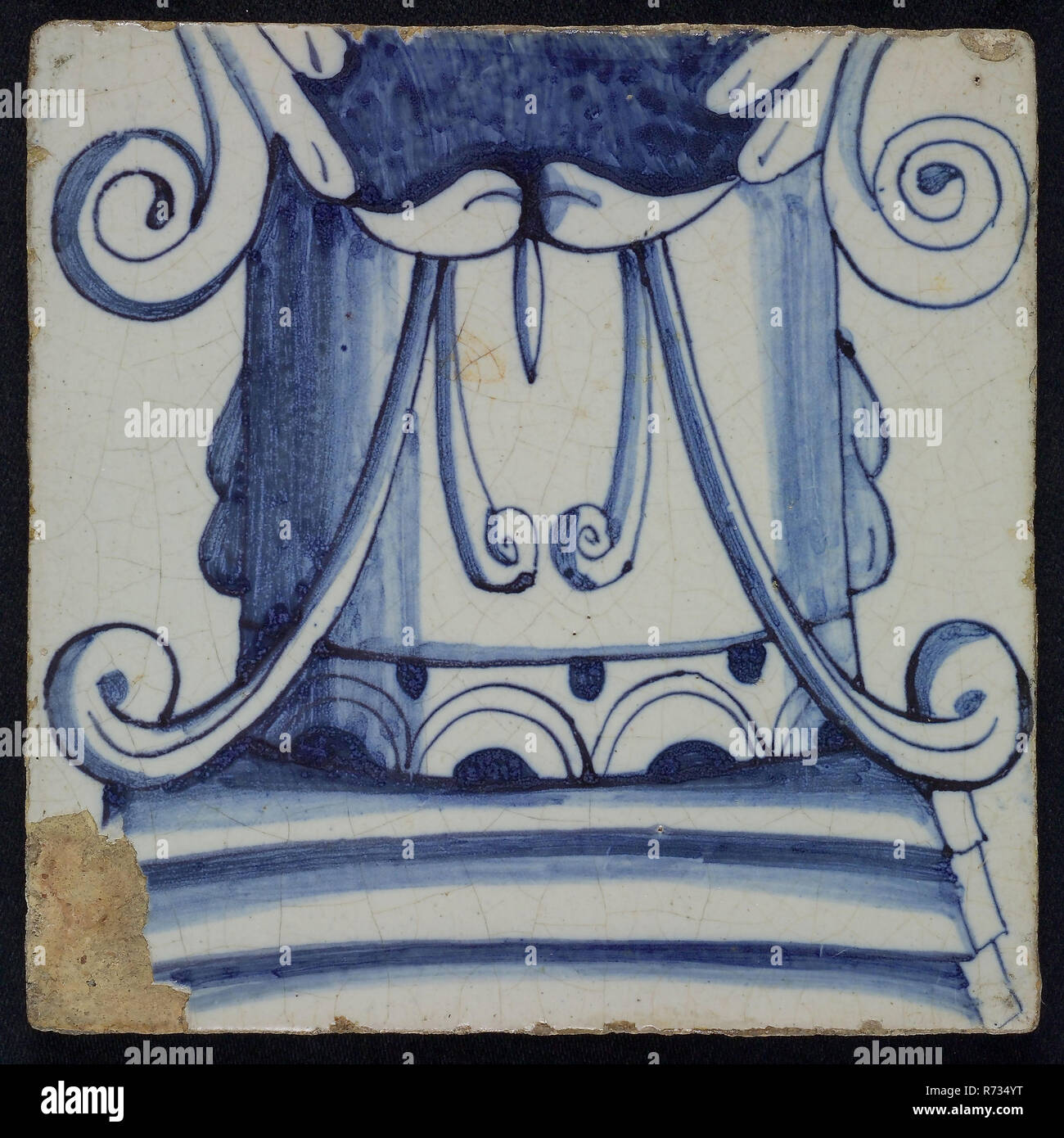 Blue tile of an upper part of corinthian column with volutes, upper ...