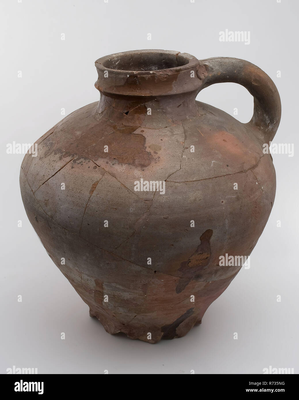 Large pottery water jug on eight stand lobes, narrow neck openings ...