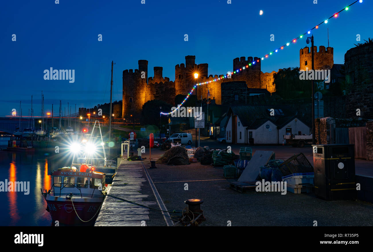 Conwy Castle and Quay on the River Conwy, North Wales. The bright ...