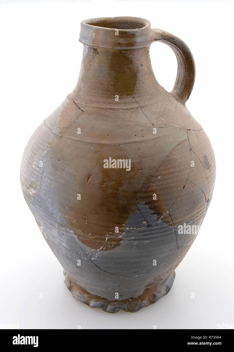 Stoneware jug, large and rounded model with wide band ear, on squeeze ...