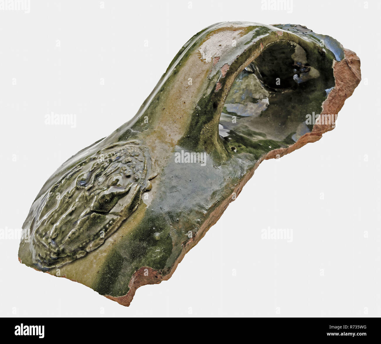 Earthenware fragment with ear and cartouche, green and yellow glazed ...