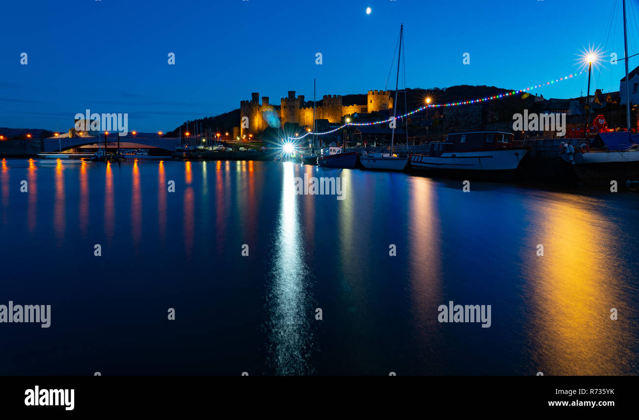 Conwy Castle and Quay on the River Conwy, North Wales. The bright ...