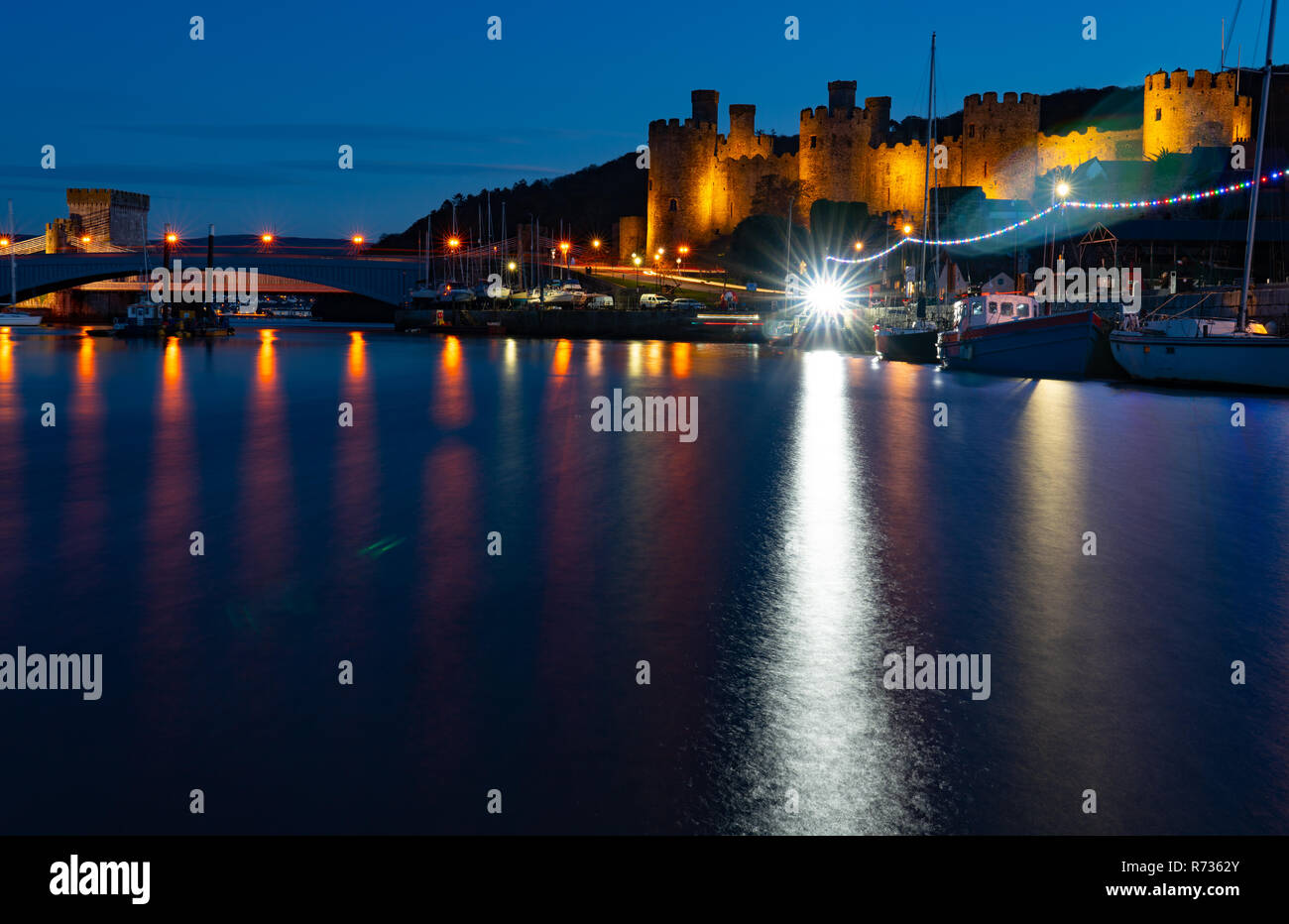 Conwy Castle and Quay on the River Conwy, North Wales. The bright ...