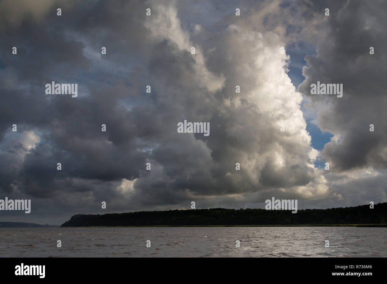 Large thunderstorm clouds building over the Hudson River and Piermont ...