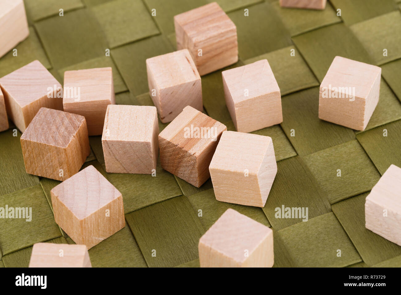 Wooden cubes on bamboo background Stock Photo - Alamy