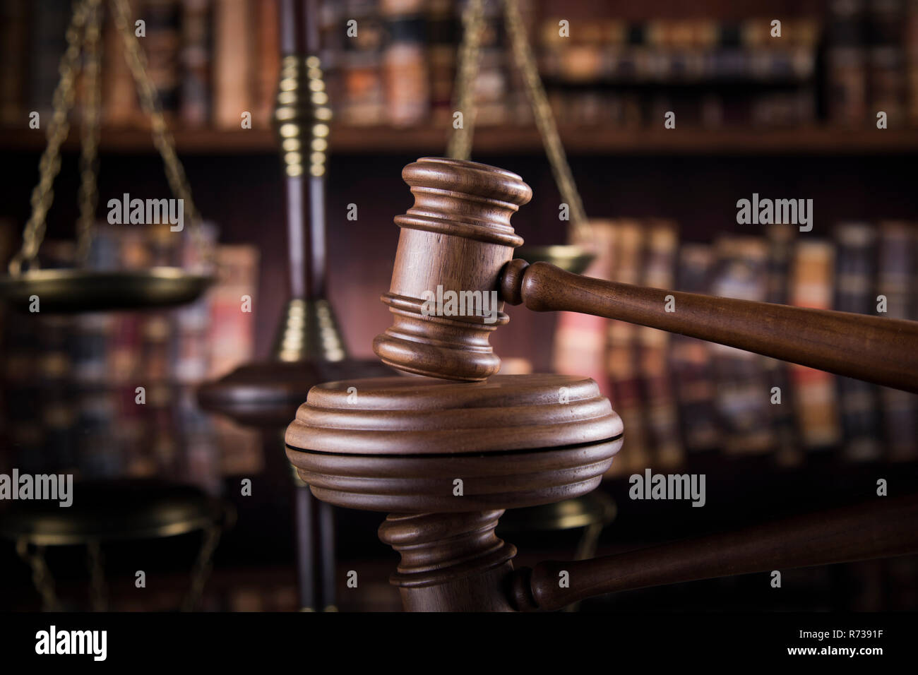 Law theme, mallet of the judge, justice scale, mirror reflection ...
