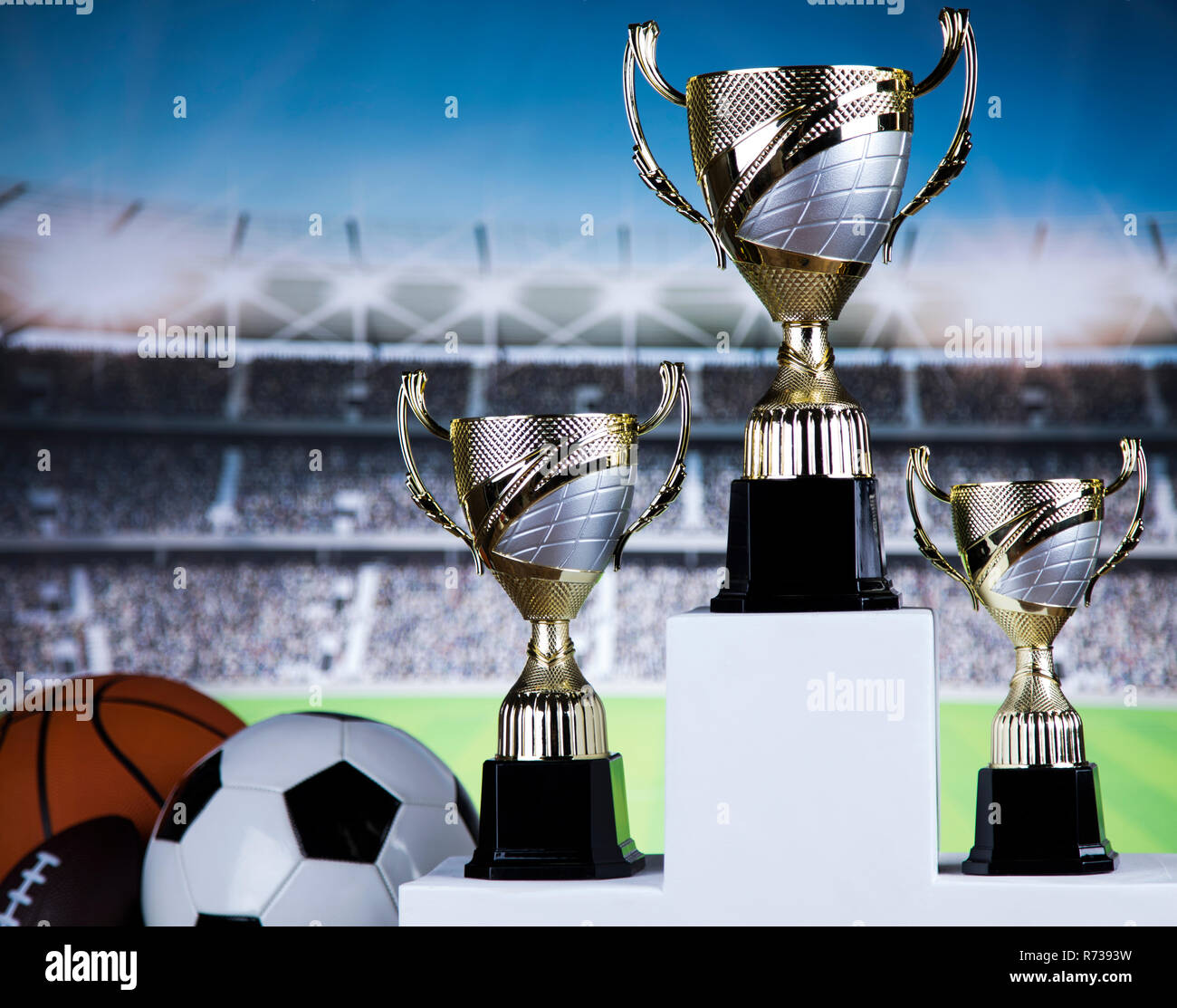 Sport podium, Cups of winners award Stock Photo - Alamy