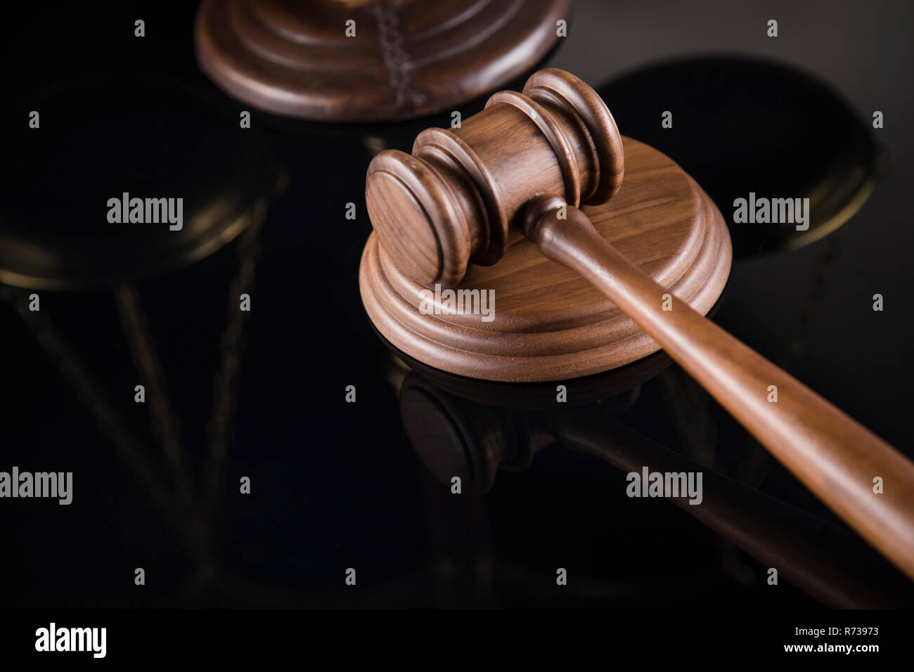 Law theme, mallet of the judge, justice scale, mirror reflection ...