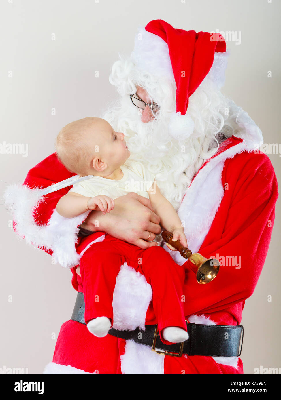 Christmas family holiday concept. Father wearing santa claus hat ...