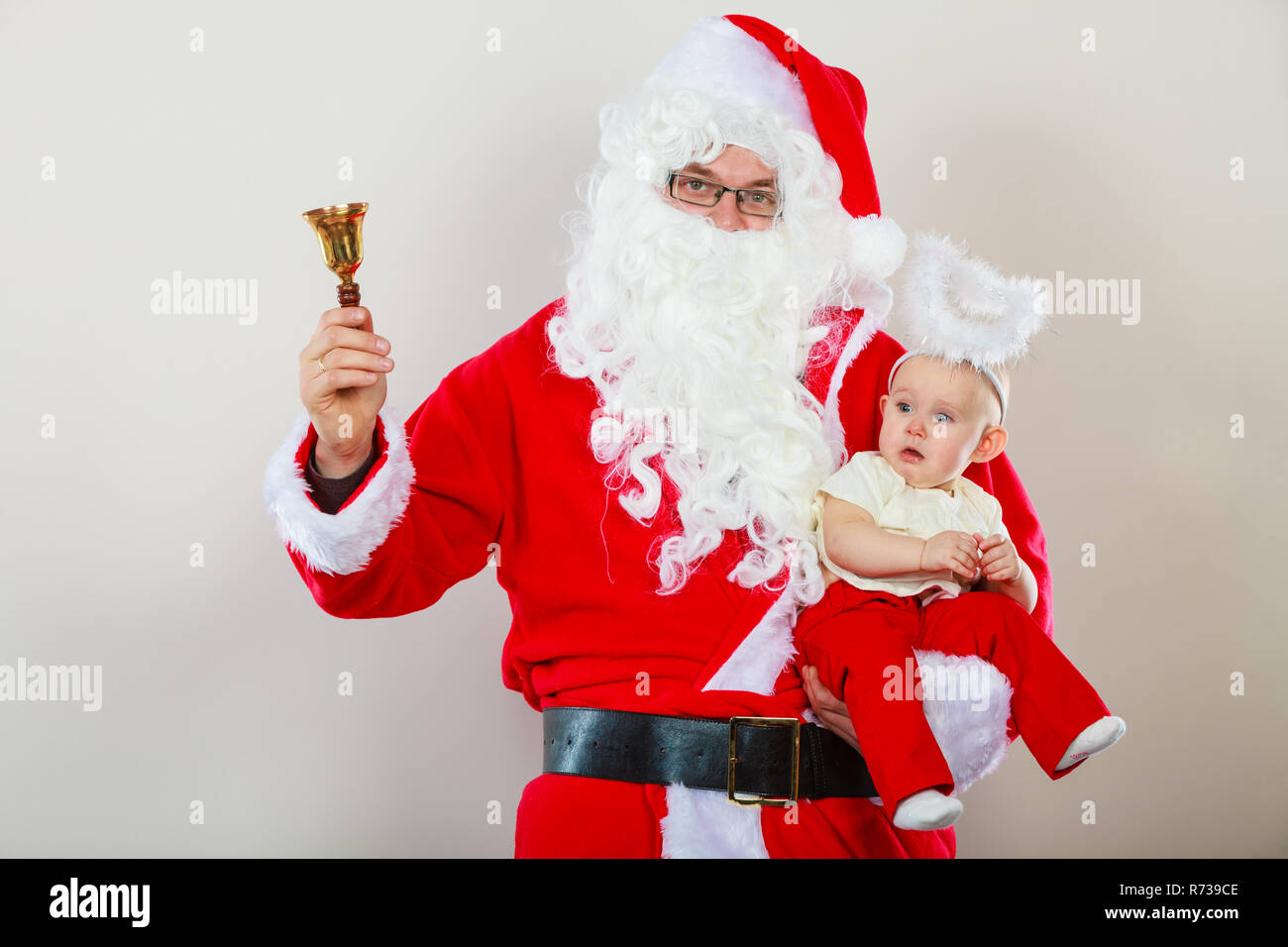 Christmas family holiday concept. Father wearing santa claus hat ...