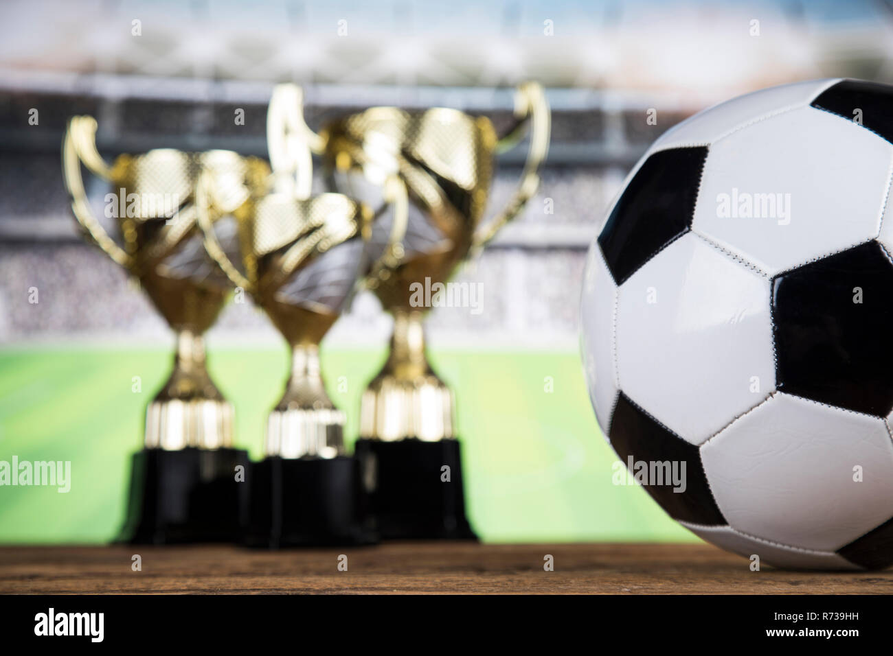 Achievement trophy, winning sport background Stock Photo - Alamy