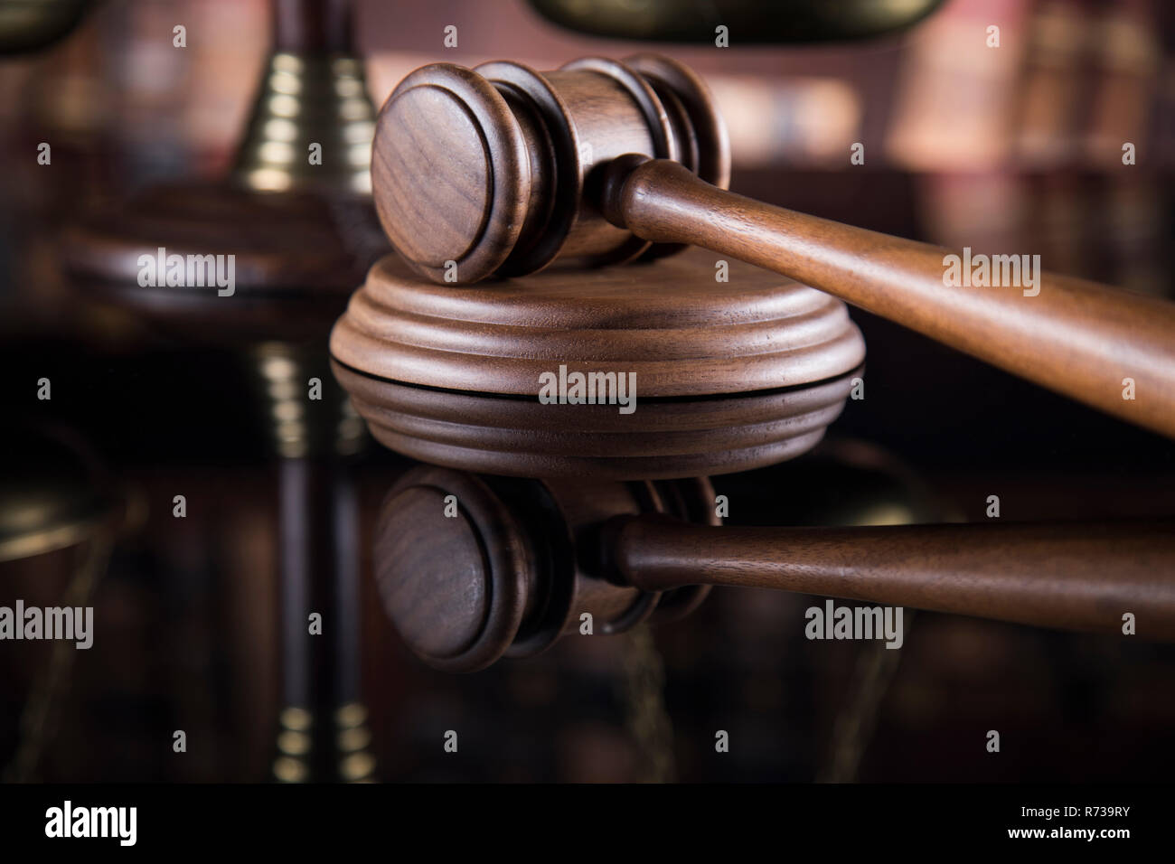 Law theme, mallet of the judge, justice scale, mirror reflection ...