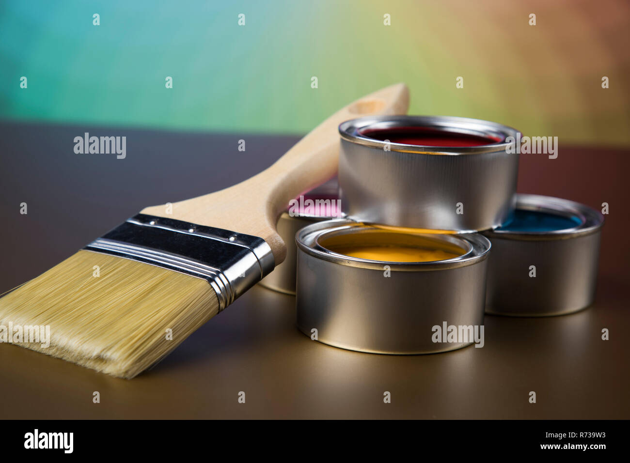 Paint brush, tin can and color guide samples Stock Photo - Alamy