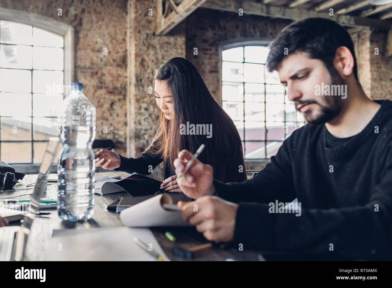 Designers at work in studio Stock Photo - Alamy
