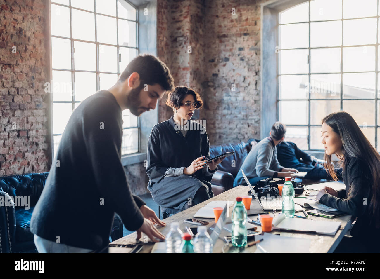Designers brainstorming in studio Stock Photo - Alamy