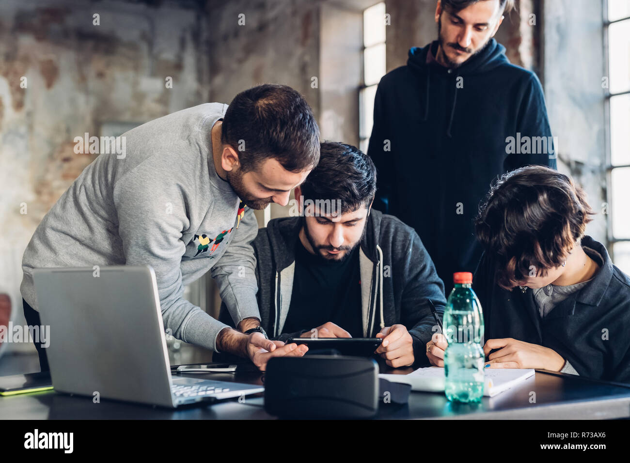 Designers brainstorming in studio Stock Photo - Alamy